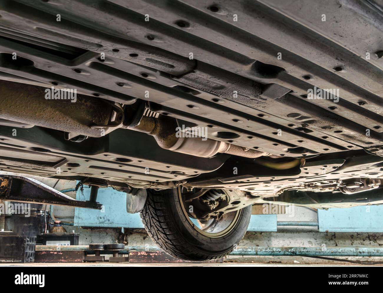 The car at the service station bottom view is visible - the lower ...