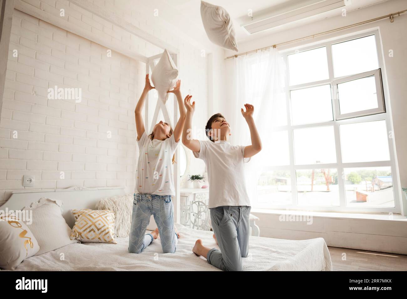 Boy throwing girl hi-res stock photography and images - Alamy