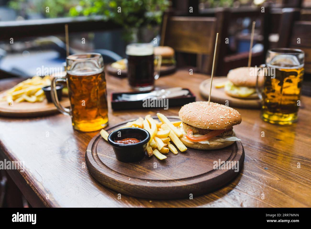 Hamburger table restaurant Stock Photo - Alamy