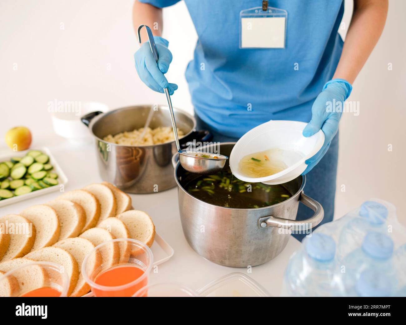 High angle person giving out food Stock Photo - Alamy