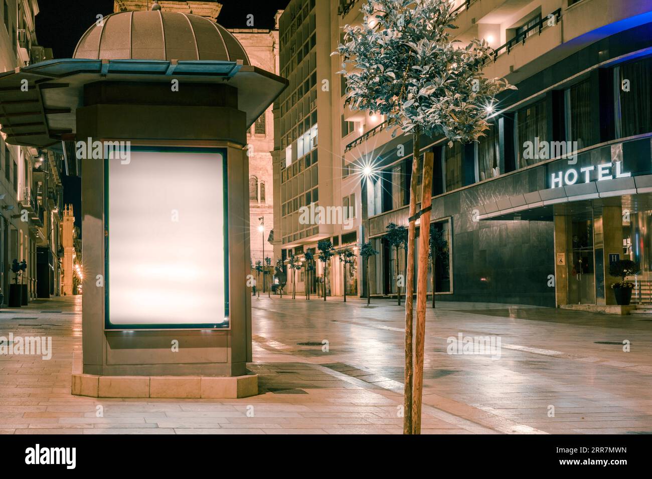 Illuminated billboard near street Stock Photo - Alamy