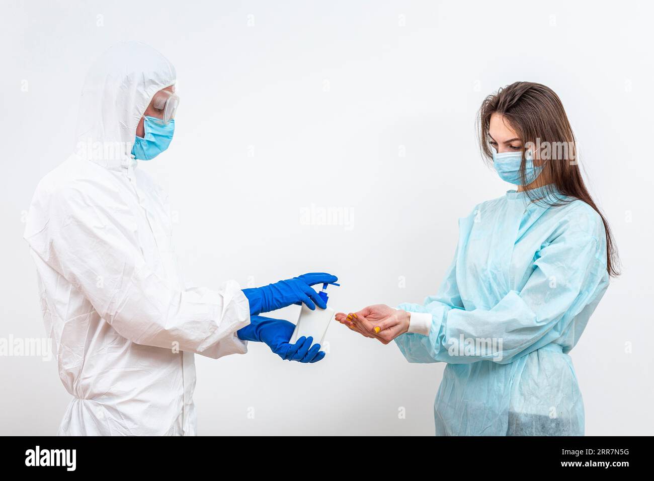 Person hazmat suit with pacient Stock Photo - Alamy