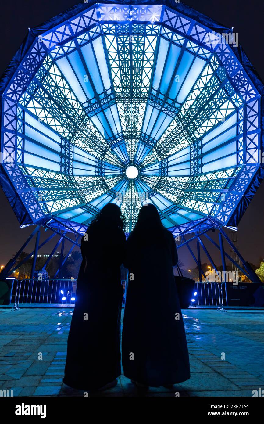 210403 -- RIYADH, April 3, 2021 -- Visitors are seen at a light ...