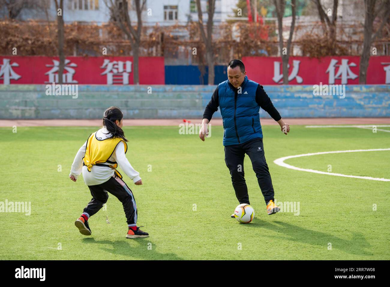 210405 -- SHAWAN, April 5, 2021 -- Xia Songhao R and his students Ma ...