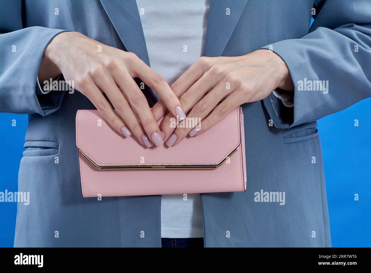 Hands holding hold handbag hi-res stock photography and images - Alamy