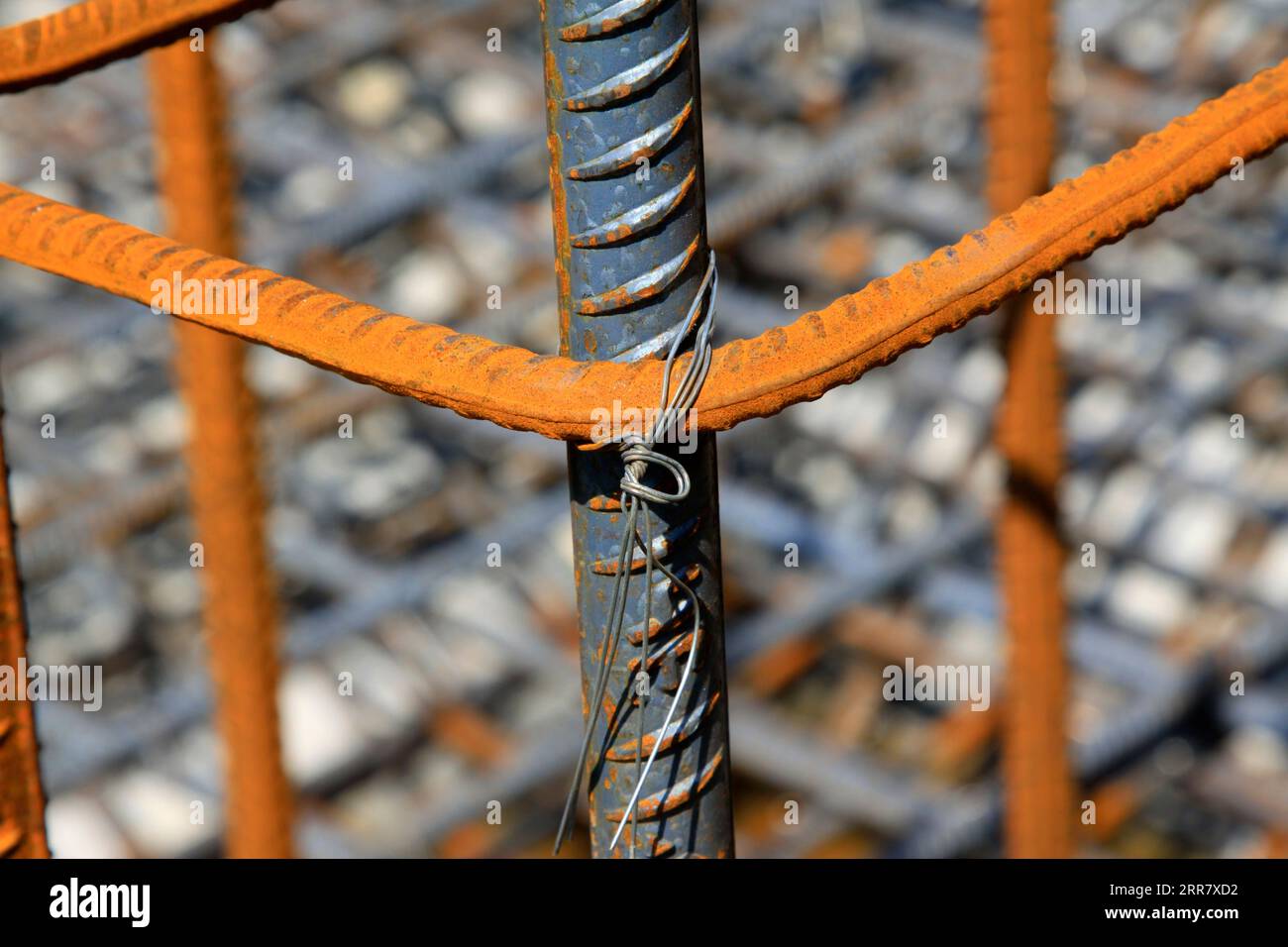 Screw steel binding together, in the construction site Stock Photo - Alamy