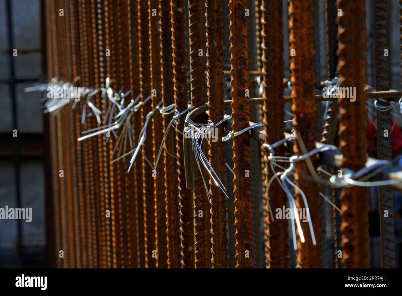 twisted steel and binding wire in the construction site Stock Photo - Alamy