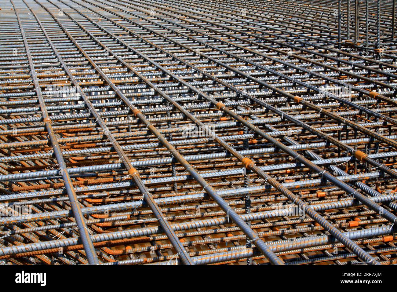 Screw thread steel bar framework in the construction site Stock Photo ...