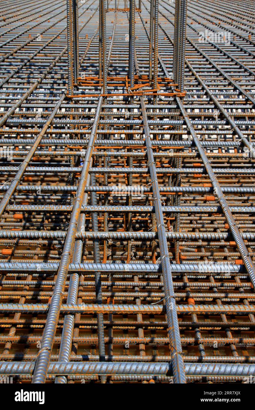 Screw thread steel bar framework in the construction site Stock Photo ...