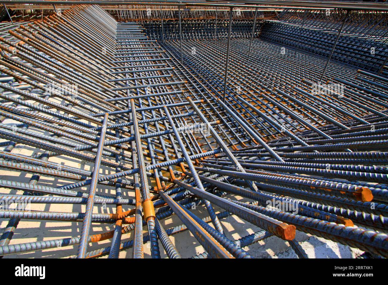 Screw thread steel bar framework in the construction site Stock Photo ...