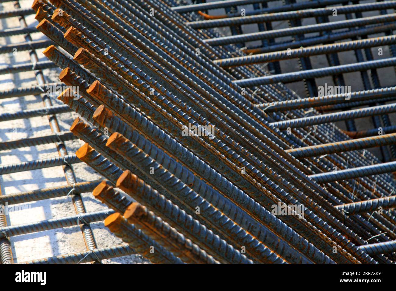 Screw thread steel bar framework in the construction site Stock Photo ...