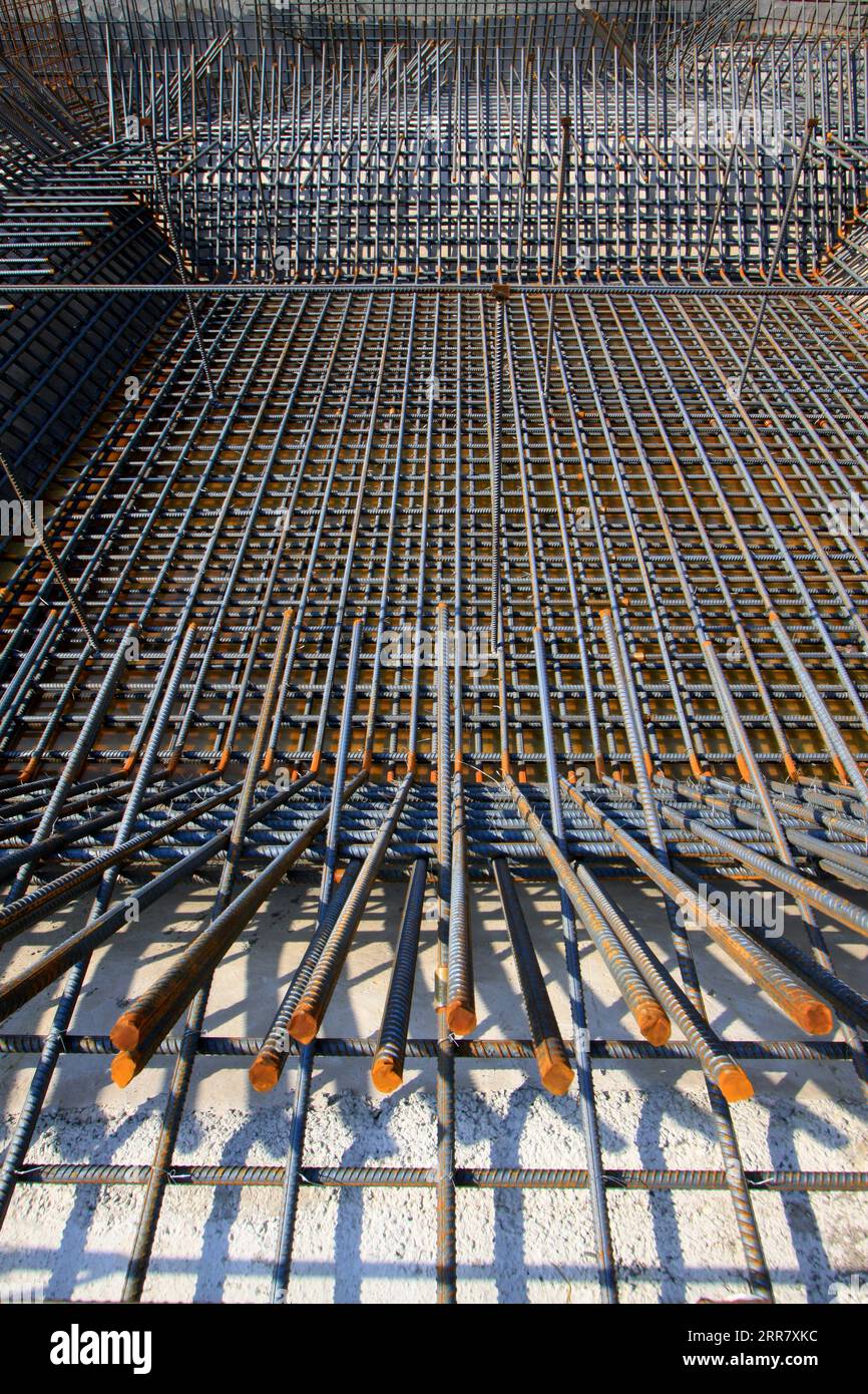 Screw thread steel bar framework in the construction site Stock Photo ...