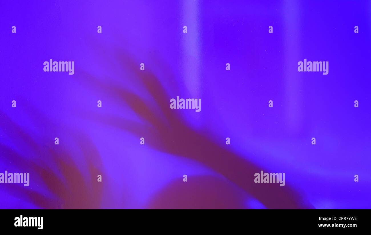 Defocused abstact silhouette of arm, hand spooky action, alien, ghost ...