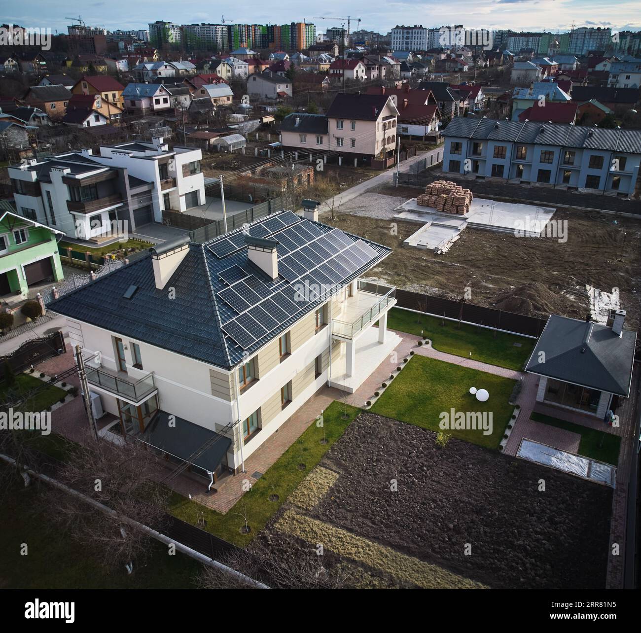 Aerial view of residential autonomous house with photovoltaic solar ...
