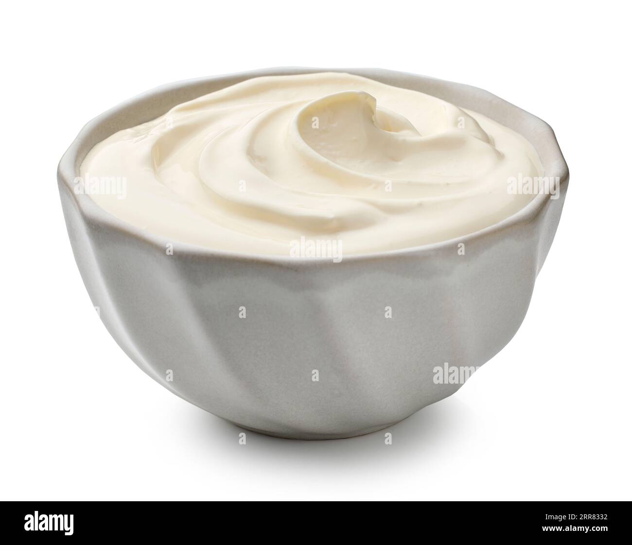 sour cream yogurt in bowl isolated on white background Stock Photo - Alamy
