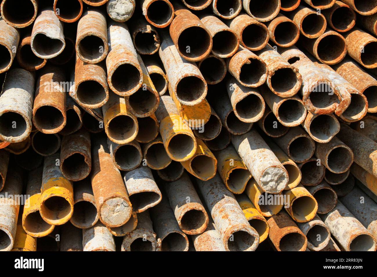 Rust deformation steel pipe in the construction site Stock Photo - Alamy