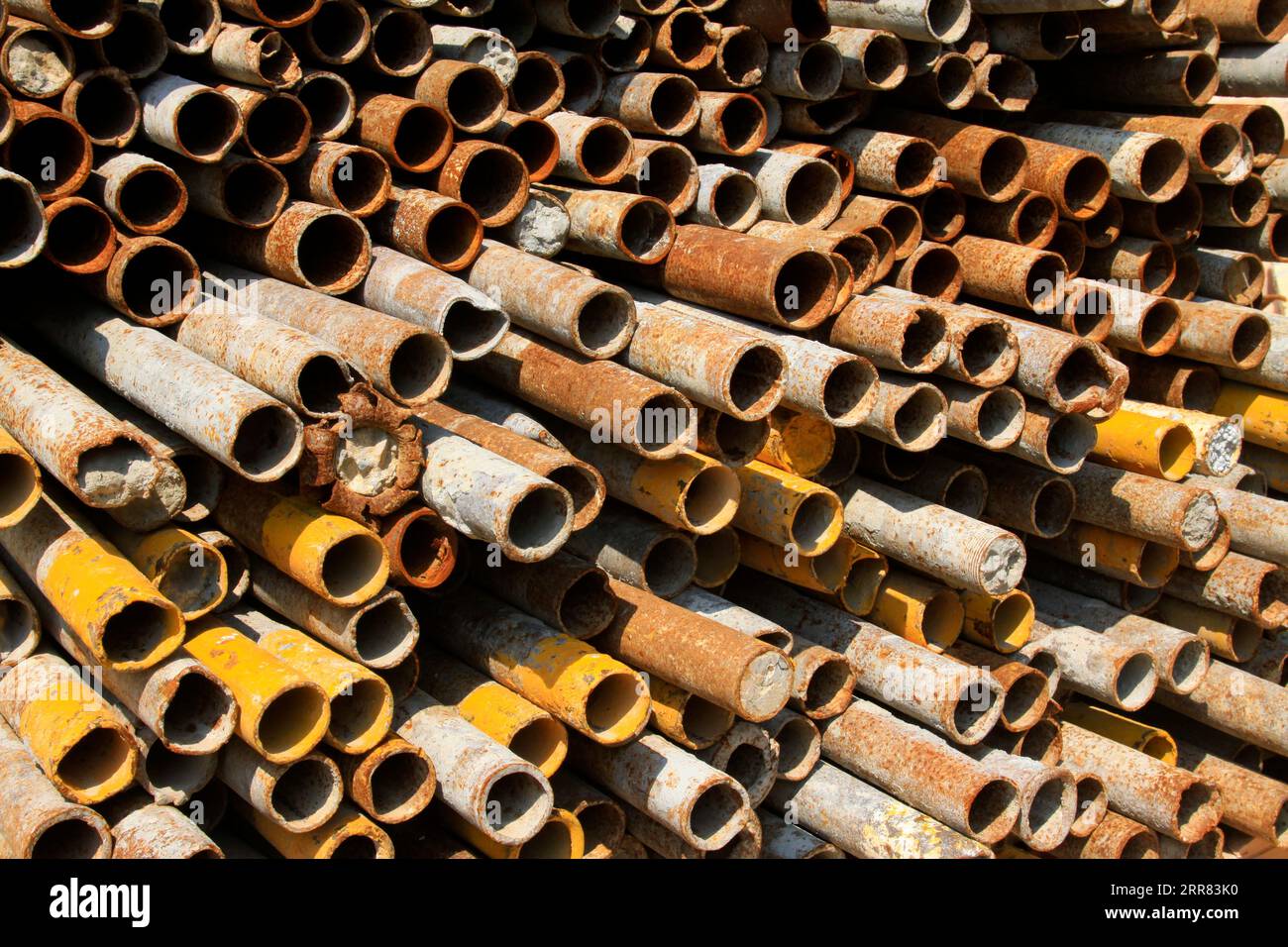 Rust deformation steel pipe in the construction site Stock Photo - Alamy