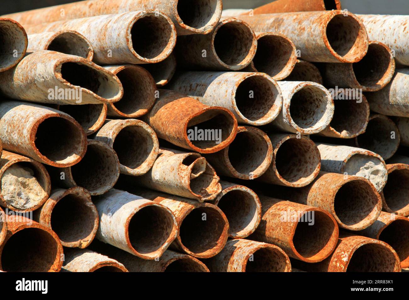 Rust deformation steel pipe in the construction site Stock Photo - Alamy