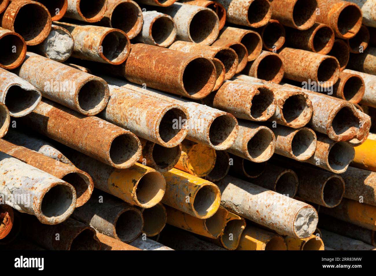 Rust deformation steel pipe in the construction site Stock Photo - Alamy