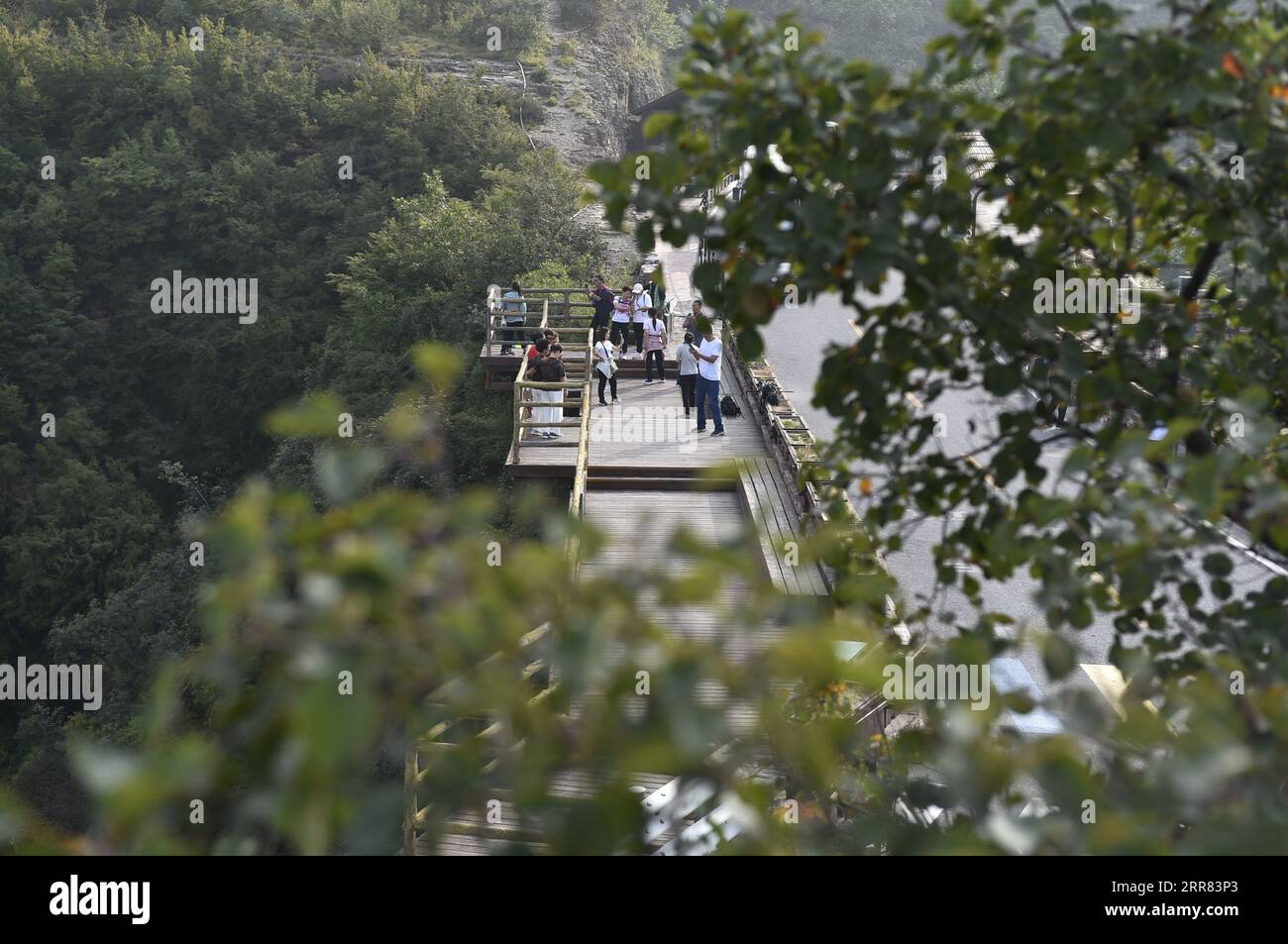 Linzhou, China's Henan Province. 6th Sep, 2023. Tourists take photos on ...