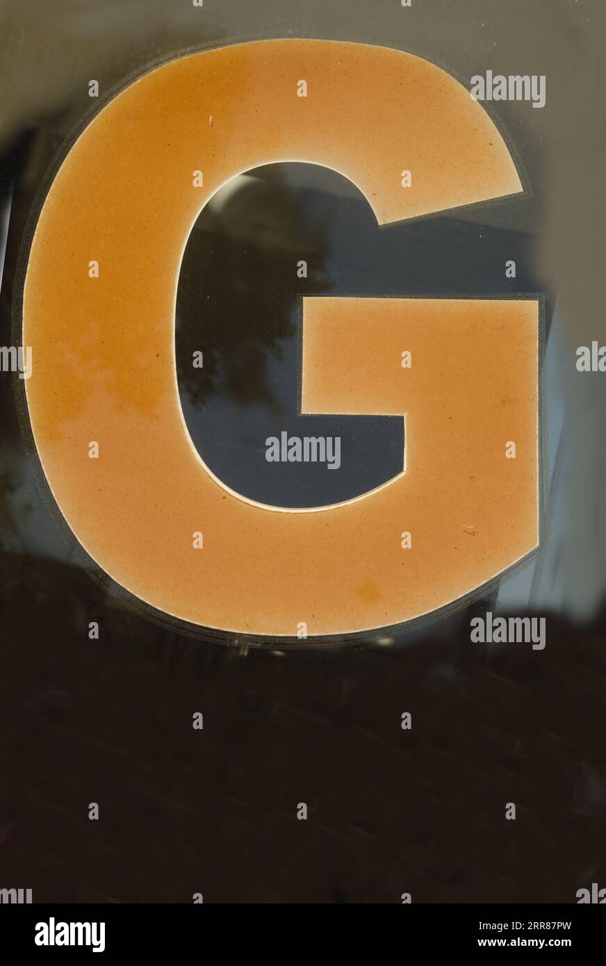 Old worn letter G, showing its age, pattern, lines and boldly grabbing ...