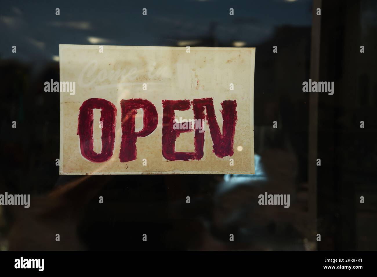 Old worn open sign, showing its age, pattern, lines and boldly grabbing ...