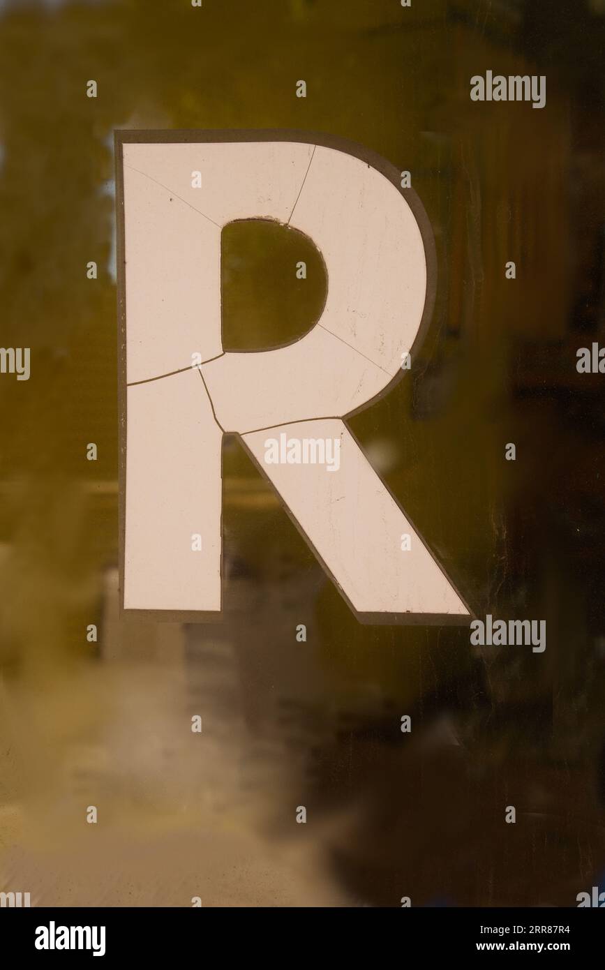 Old worn letter R, showing its age, pattern, lines and boldly grabbing ...