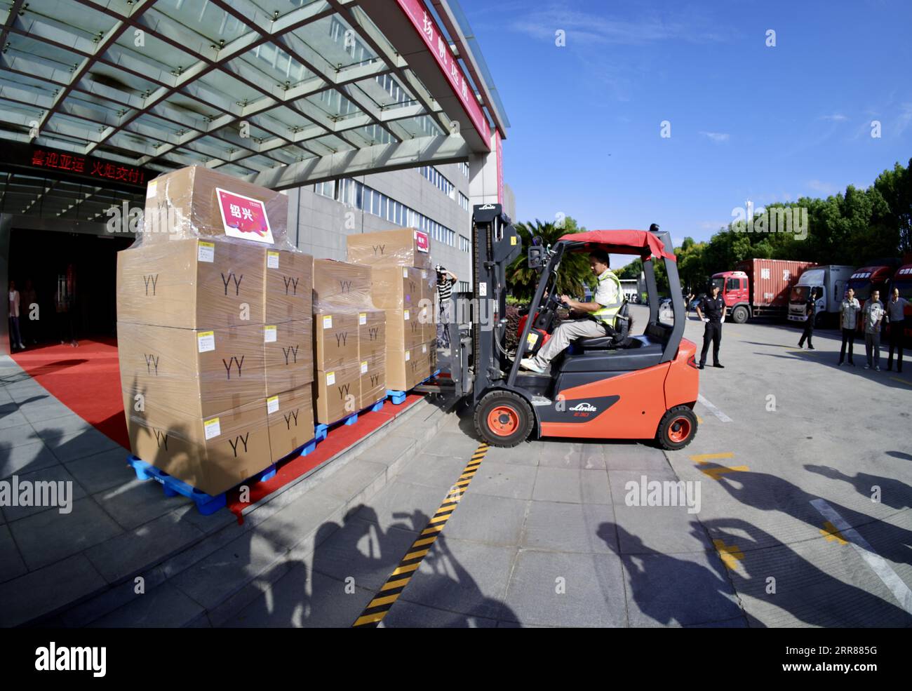 The torch for the 19th Asian Games makes its debut at a delivery ...