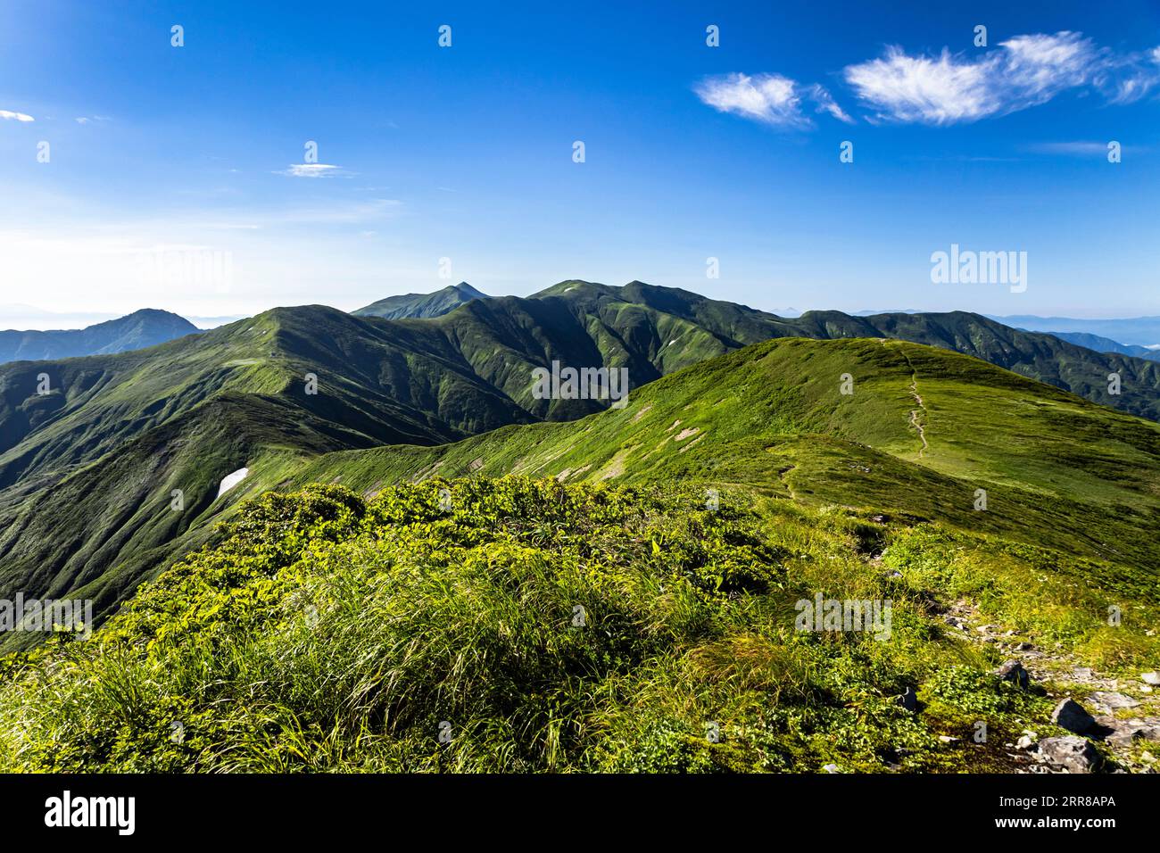 Asahi Mountain Range, back pinnacle is highest Mt.Ohasahi(Ohasahidake ...