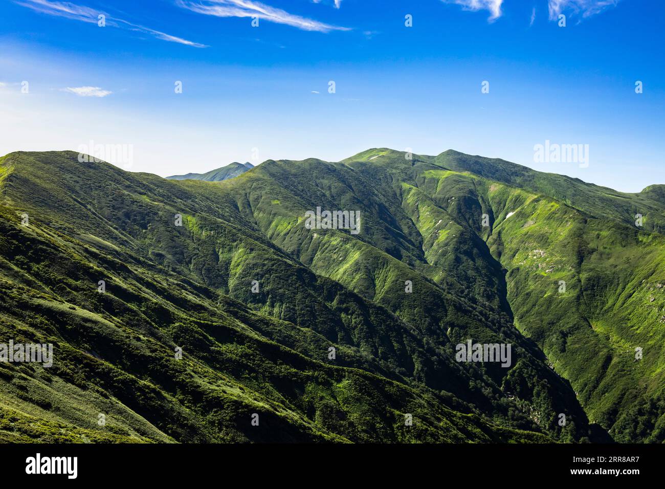 Asahi Mountain Range trekking, main range, highest Mt.Ohasahi(most back ...