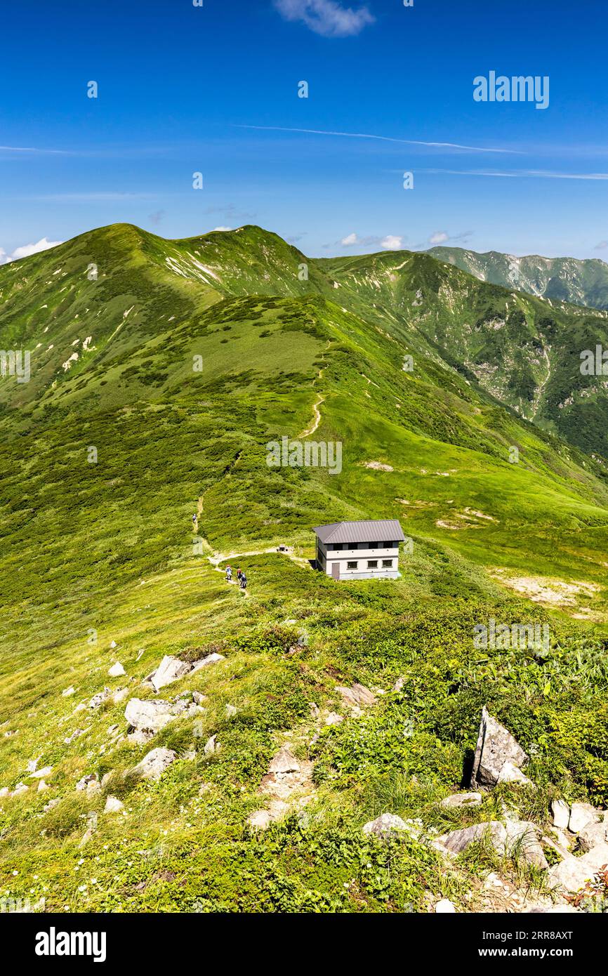 Asahi Mountain Range trekking, Ryumon shelter hut, fore is Mt.Kankoh ...
