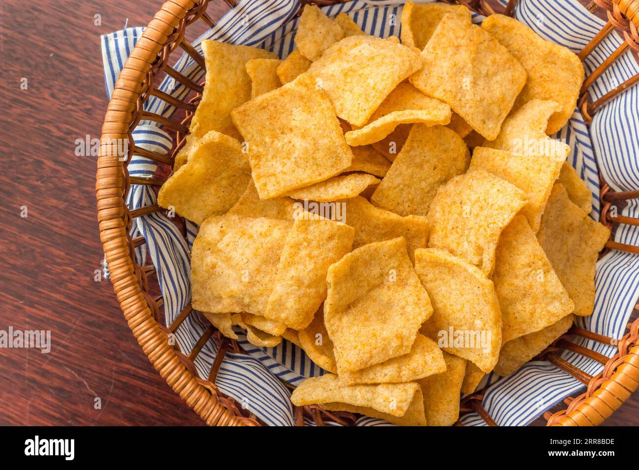 Traditional indonesian casave crackers, served in a basket Stock Photo ...