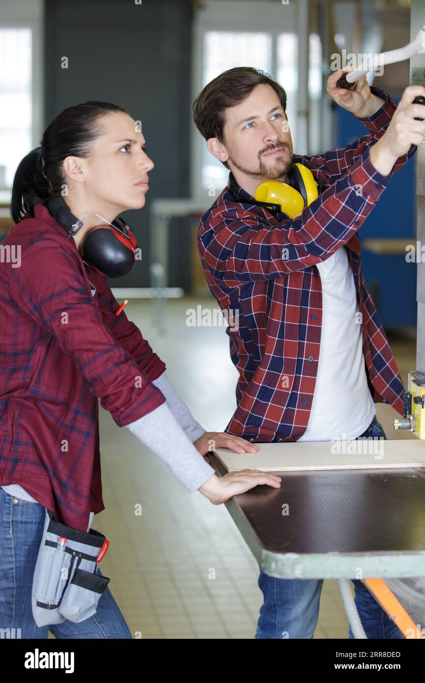 factory workers in industrial hall Stock Photo - Alamy