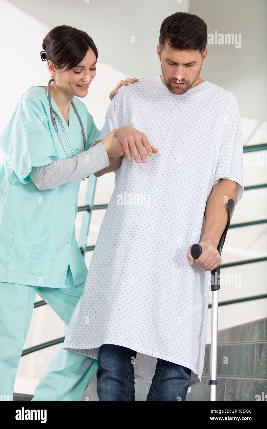 Assisting patient stairs hi-res stock photography and images - Alamy