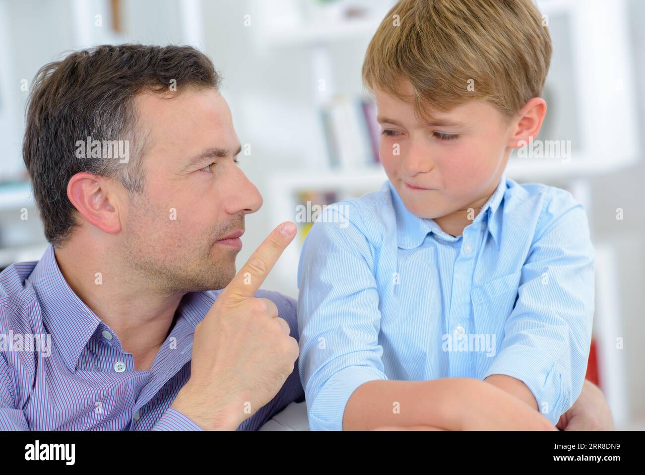 a father is upset with his son Stock Photo - Alamy