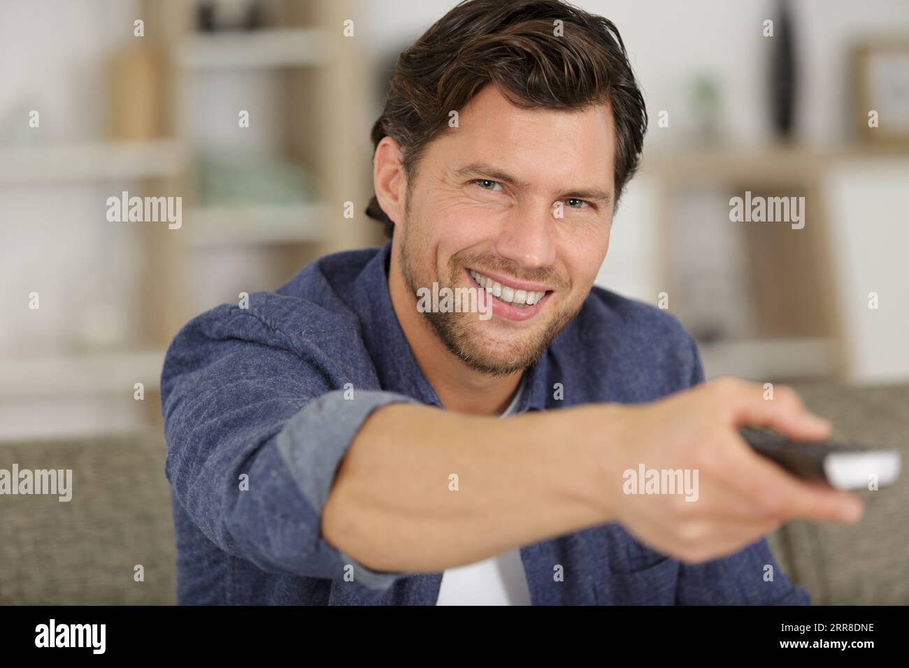 Excited man watching football hi-res stock photography and images - Alamy