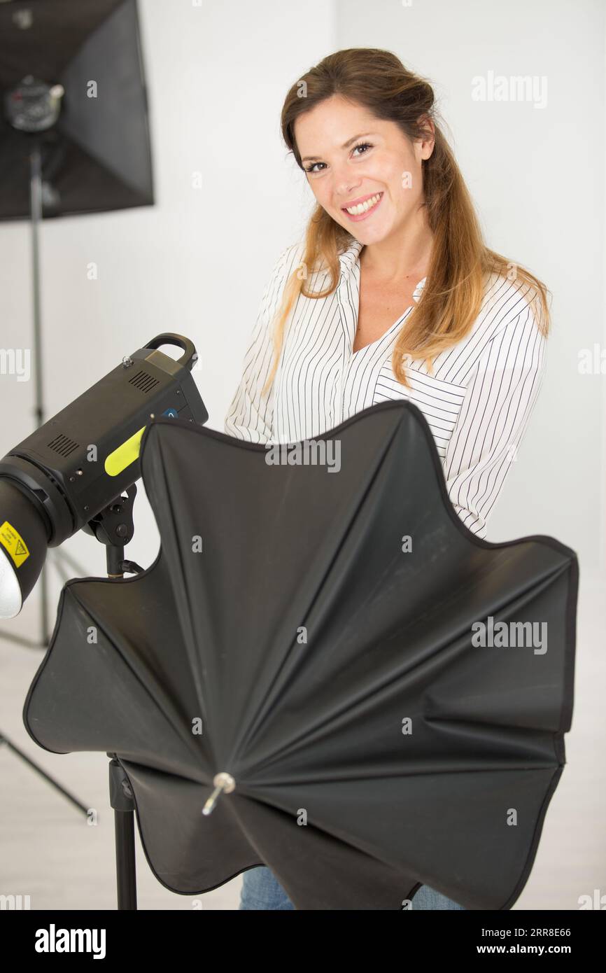 Preparing to open an umbrella hi-res stock photography and images - Alamy