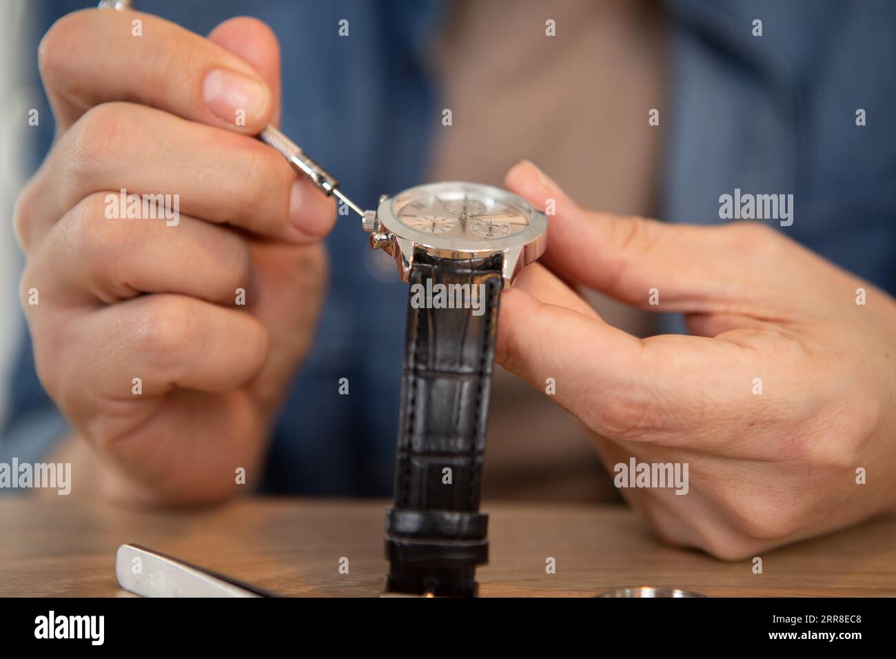 Man looking at pocket watch hi-res stock photography and images - Alamy