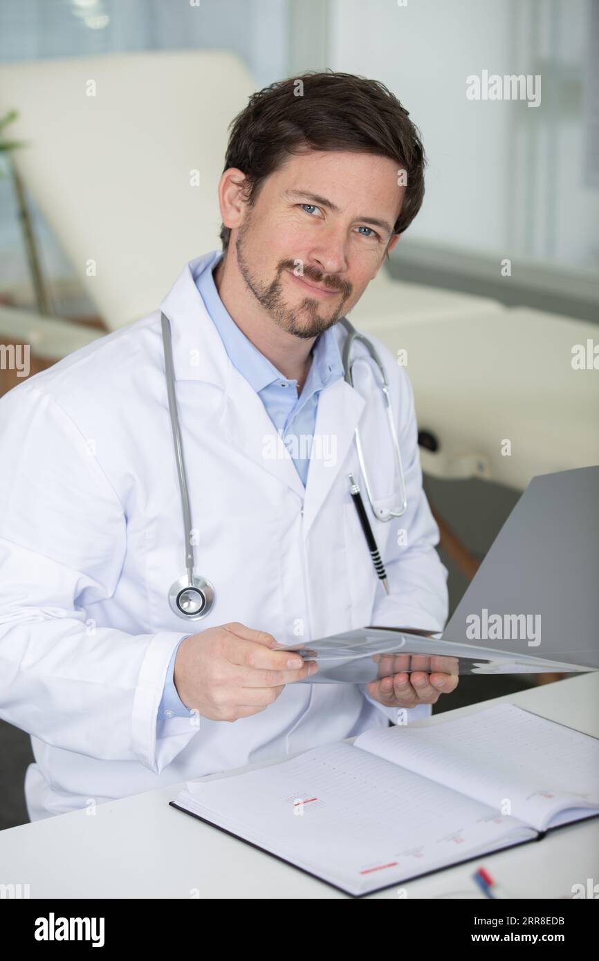 happy radiologist doctor checking xray Stock Photo - Alamy
