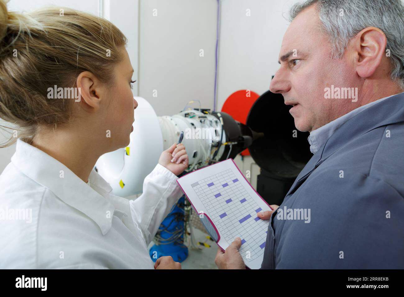 aviation engineer doing mechanical diagnostic Stock Photo - Alamy