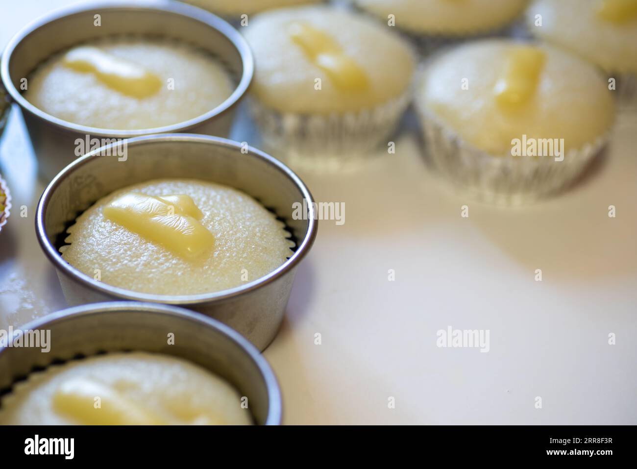 Puto cupcake in an aluminum mold. Hulmahan ng puto Stock Photo - Alamy