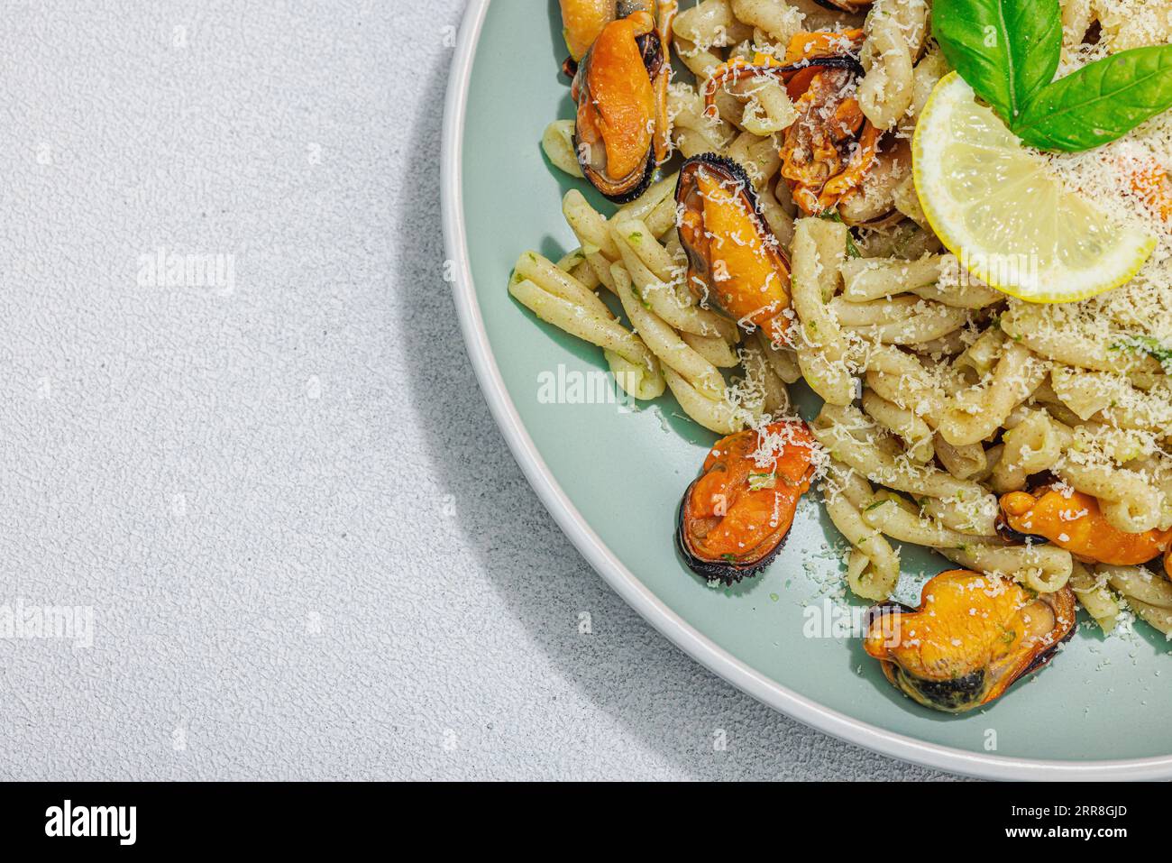 Plant based pasta with mussels, pesto and parmesan cheese. Ready to eat ...