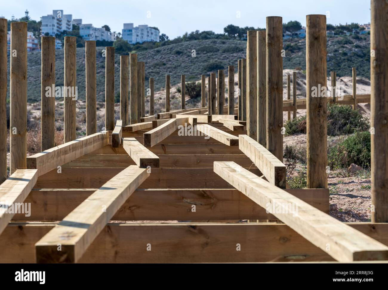 Elevated boardwalk under construction in the Carabassi beach, province ...