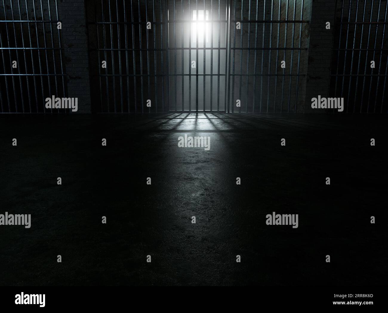 A closeup of a spolight behind jail cells iron bars casting shadows on the concrete prison floor ...