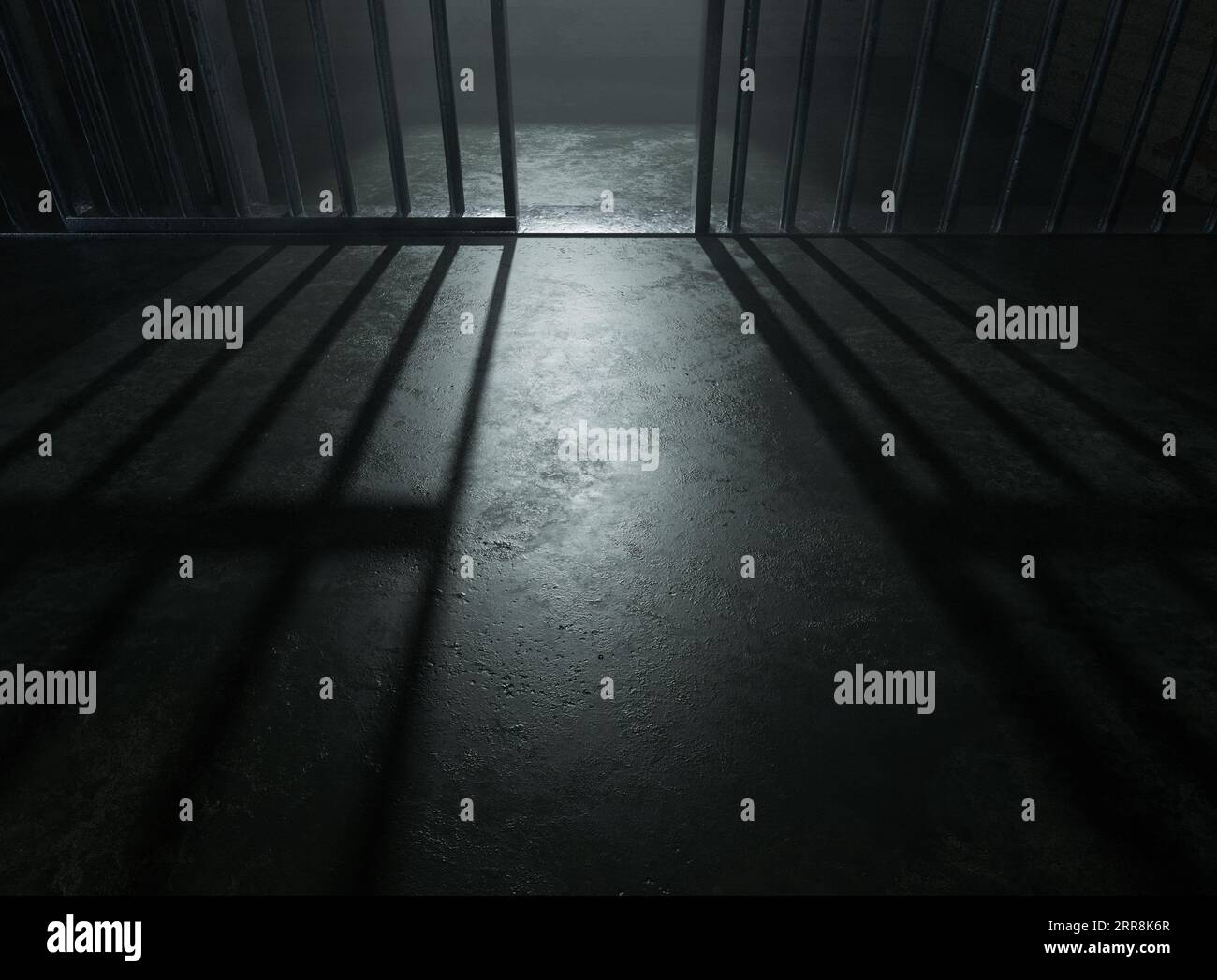 A closeup of a spolight behind jail cells iron bars casting shadows on ...