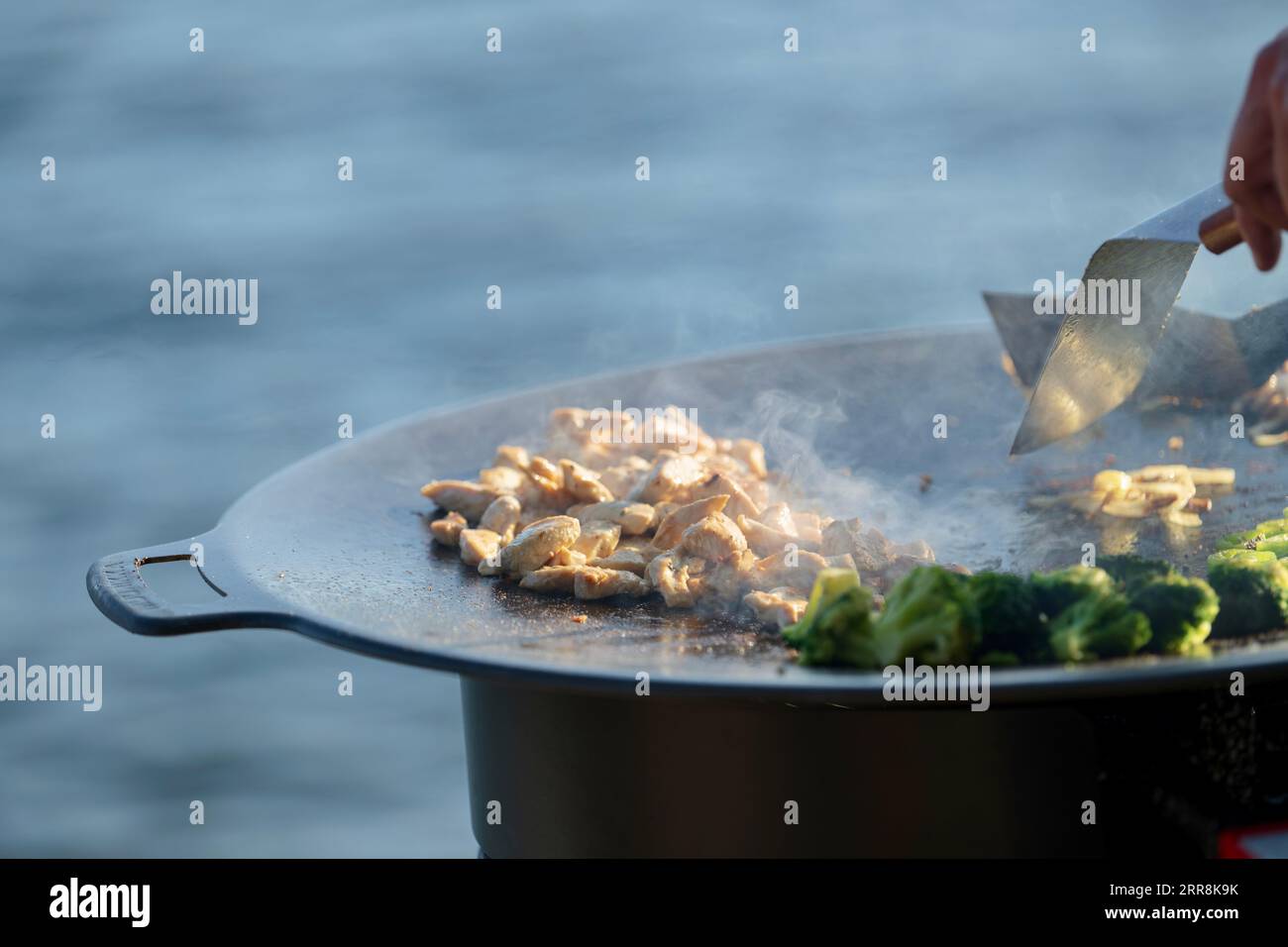 Chef stirring a large pot hi-res stock photography and images - Alamy