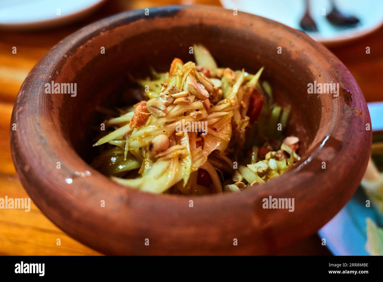 Thai Traditional Dish Som Tam (Papaya Salad) Served in a Mortar Stock ...