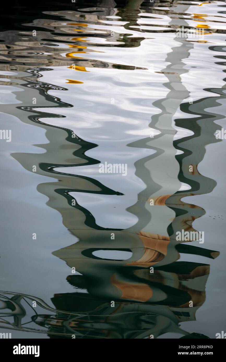 Distorted reflection in harbour, Wellington, North Island, New Zealand ...