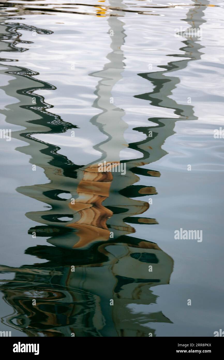 Distorted reflection in harbour, Wellington, North Island, New Zealand ...