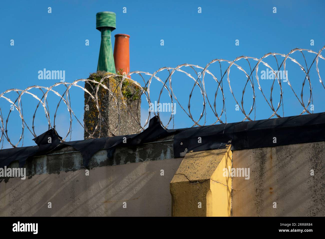 Coiled razor wire on top of prison wall, Mount Crawford, Wellington ...